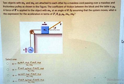 solved two objects with mi and m2 are attached to each other by a