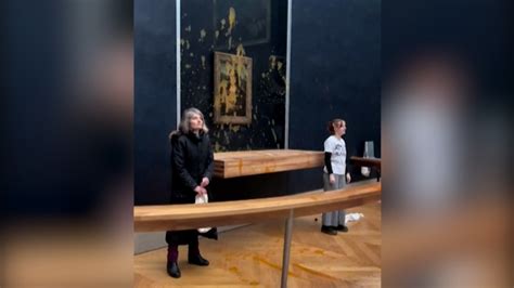 Watch Protesters Throw Soup At The Glass In Front Of The Mona Lisa