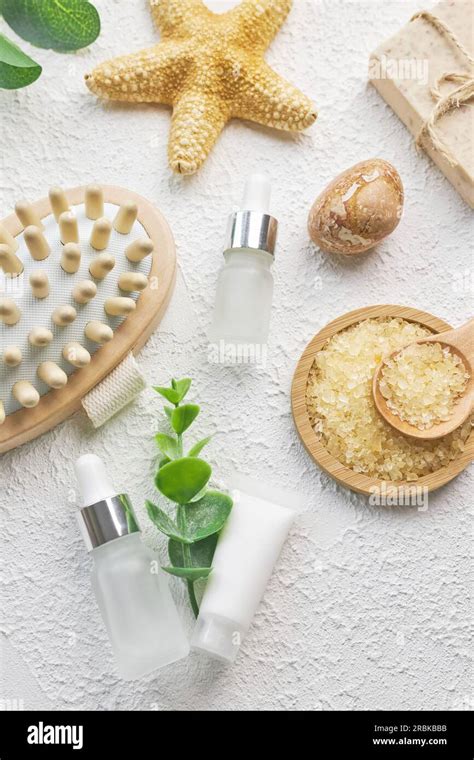 Cosmetic Massage And Bath Accessories Set On White Texture Background