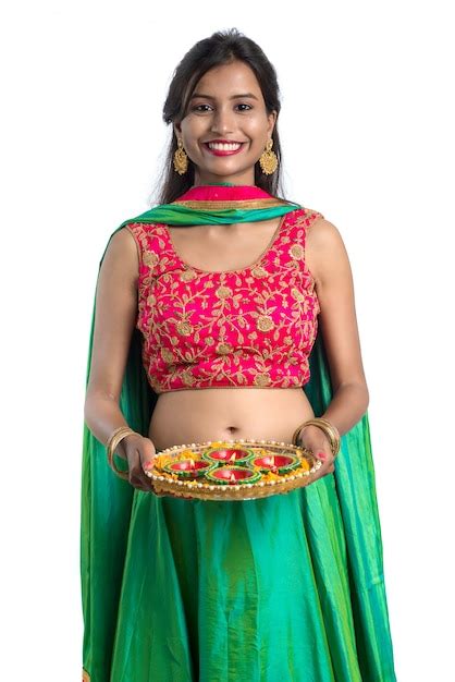 Premium Photo Portrait Of A Indian Traditional Girl Holding Diya