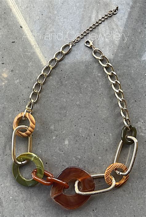 Acrylic Multi Coloured Tortoise Shell Gold Linked Necklace With A