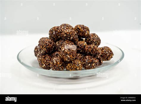Sesame Ladoo Aka Til Ko Ladoo For Makar Maghe Sankranti Dipped In