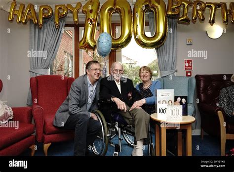Ian Brignall And Sue Whelan Sit With Their Father Ronald Brignall Who Was Presented With A