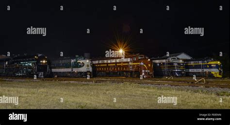 Grouping Of Nandw 611 Steam Engine With Vintage Streamliners At Night