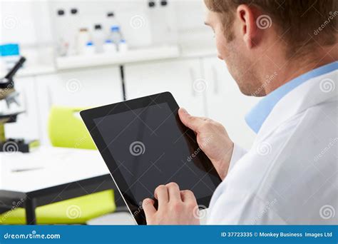scientist in laboratory using digital tablet stock image image of