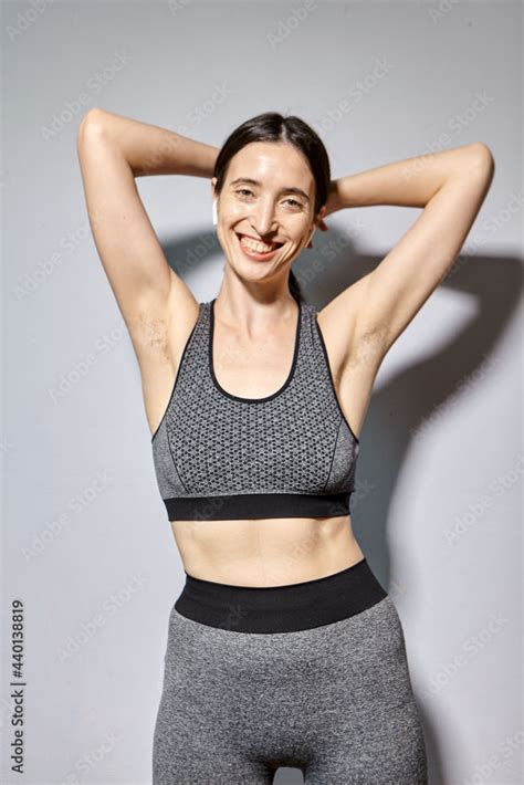 A Woman Raised Her Hand To Show The Hair Under Her Armpits A Natural Girl With Unshaven Armpits