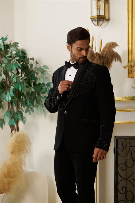 Black Partywear Suit With Peocock Handwork Design