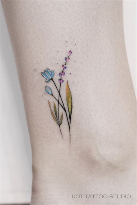 Цветная тату для девушек на ноге Женское тату с цветами Женская татуировка Татуировка на