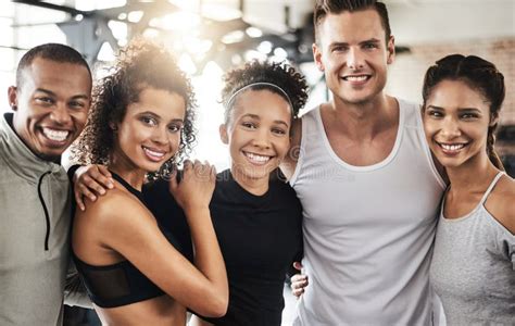 Friends Men And Women With Smile At Gym With Diversity Hug And