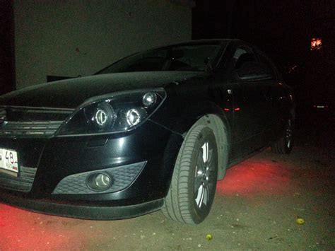 Проекторы в дверях и подсветка дна авто — Opel Astra H, 1,6 л, 2011 ...