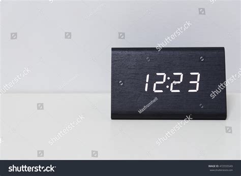 2 Black Digital Clock On White Background Showing Time 12 23 Twelve Hours Twenty Three Minutes