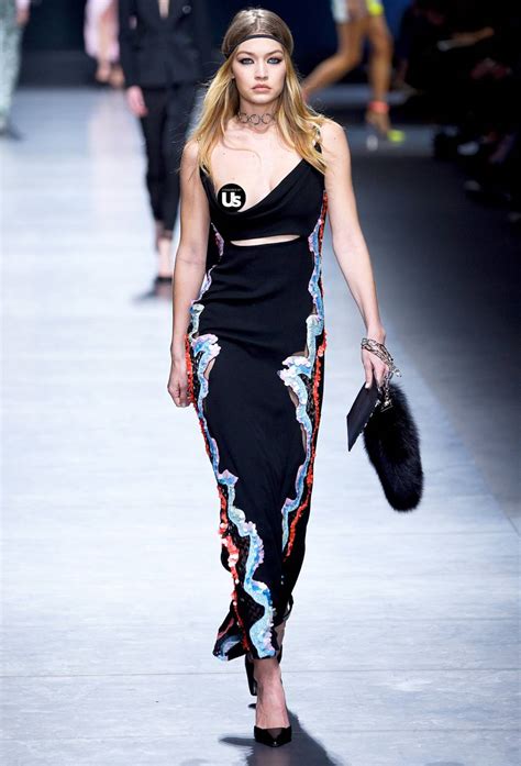 Gigi Hadid Suffers Wardrobe Malfunction Nip Slip On Versace Runway