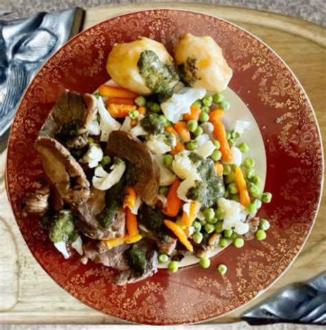 Roast Lamb Roast Potatoes Mixed Vegitables Of Peas Carrots Cabbage