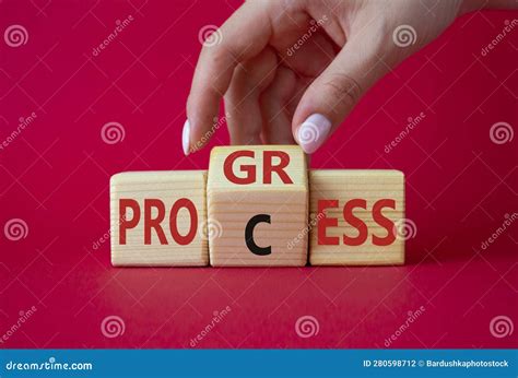 Process And Progress Symbol Businessman Hand Turns Wooden Cubes And