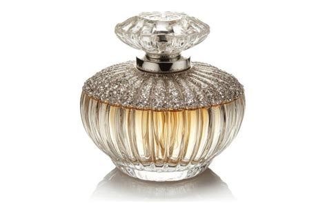 A Clear Glass Perfume Container Holding 30 50 Ml Featuring A