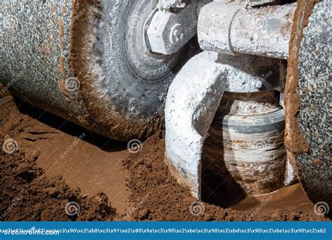 Millstones Of Industrial Melanger Grind Cocoa In The Process Of Making