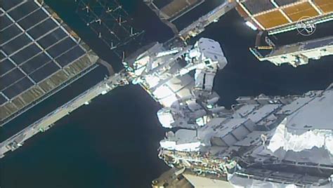 Spacewalking Astronauts Prepare International Space Station For New Solar Arrays Space