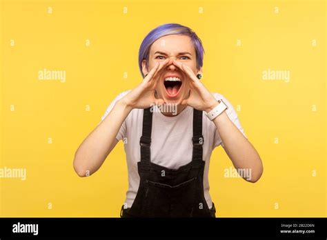 Attention Portrait Of Hipster Girl With Violet Short Hair In Denim