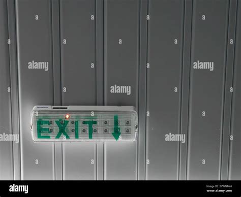 Illuminated Exit Sign A Path To Escape Stock Photo Alamy