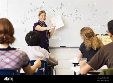 Woman Teaching Geometry Class Stock Photo Alamy