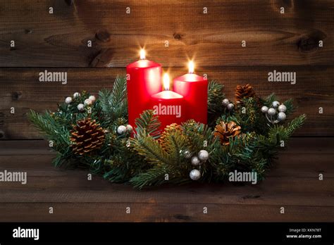 Third Advent Decorated Advent Wreath With Three Red Burning Candles