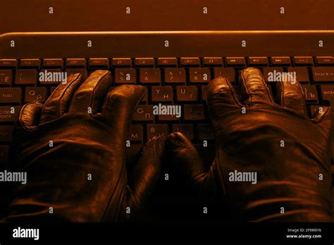 Hacker S Hands On Laptop Keyboard Hacking A Security System Hacker In Gloves Stock Photo Alamy