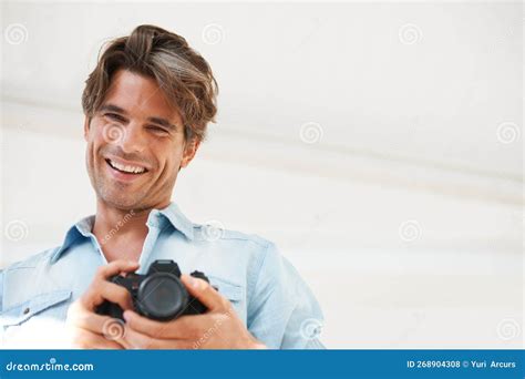 He Has A Passion For Photography Portrait Of A Young Photographer