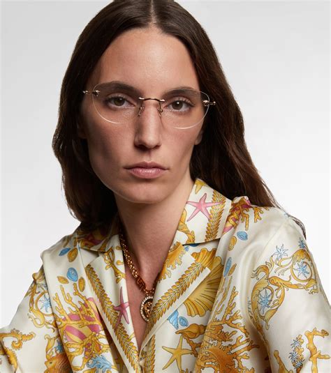 Round Glasses In Gold Versace Mytheresa