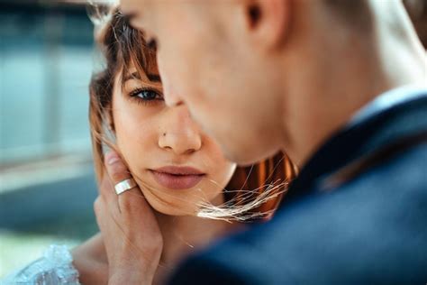 Premium Photo Close Up Of Couple Embracing Outdoors