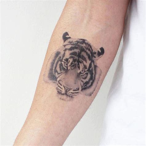 12 Minimalist Tiger Tattoo Ideas That Will Inspire You To Get Inked