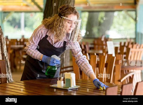 Person Cleaning Tables Hi Res Stock Photography And Images Alamy