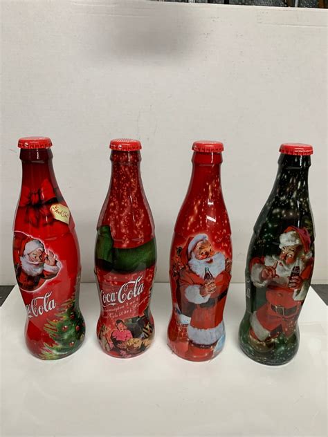 Äldre Coca Cola flaskor med julmotiv Köp på Tradera 599169863