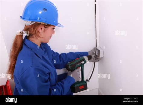 Electrician Installing A Wall Socket Stock Photo Alamy