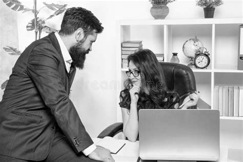 Interested In Flirting With Him Flirty Woman Make Eyes At Man In Office Stock Image Image Of
