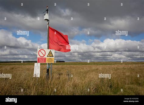 A Red Warning Flag Flies On The Perimeter During Military Live Firing