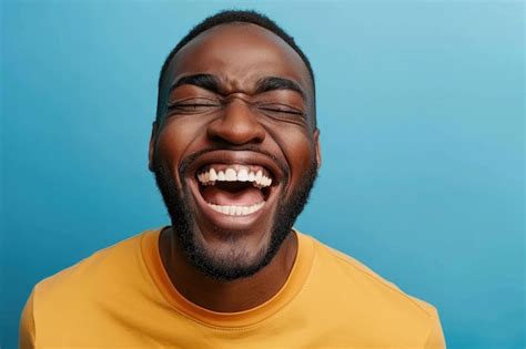 Premium Photo Young Man Laughing At Funny Meme Showing White Teeth