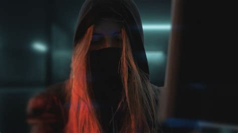 Anonymous Hacker Woman Playing Video Games Free Stock Video