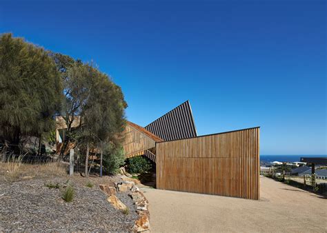 Split House By Bkk Architects Is Made Up Of Angular Wooden Structures