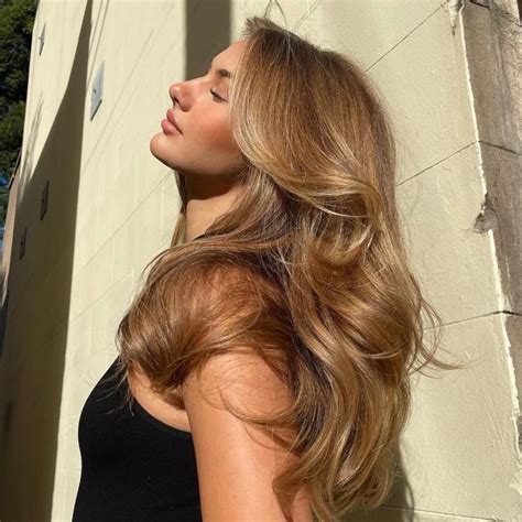 The Butterfly Haircut Is The Chicest Way To Add Volume And Texture To