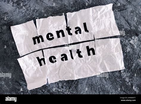 Mental Health Text On Crumpled And Torn Piece Of Paper Which Has Been