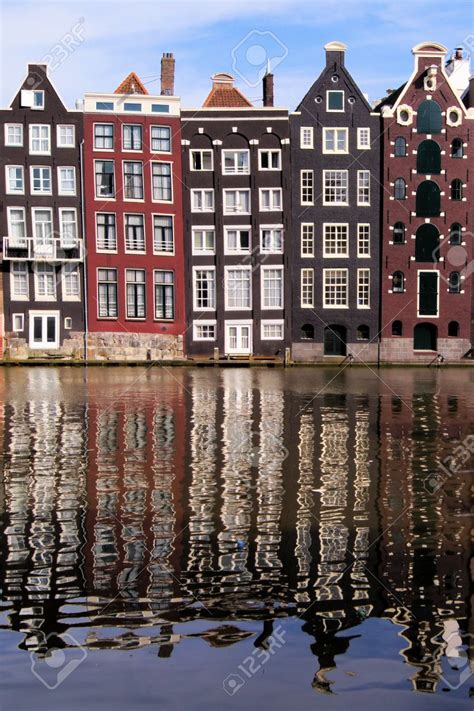 Canal Houses Of Amsterdam The Netherlands With Reflections Canal House Amsterdam Houses