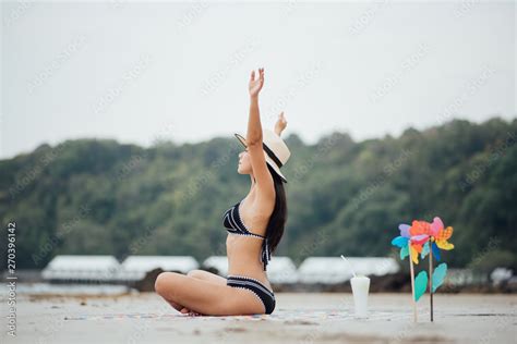 Sexy Beautiful Asian Woman On Beach Summer Vacation In Bikini Sitting