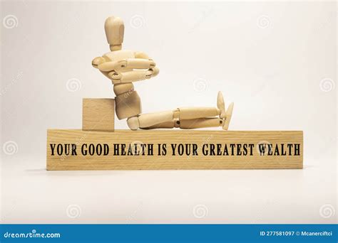 Your Good Health Is Your Greatest Wealth Written On Wooden Surface