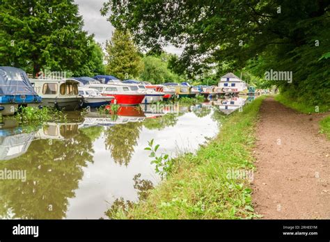 Canal Boats Moored Up Along The Monmouthshire And Brecon Canal At