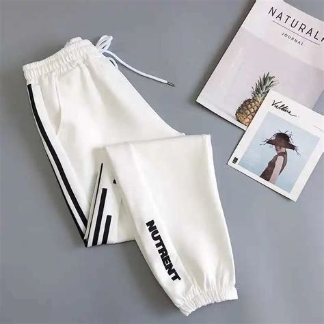 มาใหม่2022 กางเกงแฟชั่นผู้หญิง กางเกงขายาว เอวยางยืดมีเชือก ผ้าดีทรงหลวม แต่งแถบข้าง มีกระเป๋า2