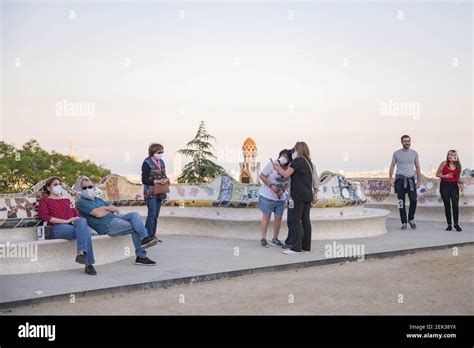 People having a walk and enjoying the views in Park s Güell main