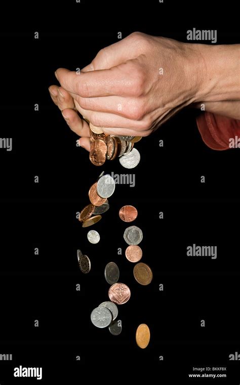 42 Yr Old Caucasian Male Hands With Money Falling Depicting Concept Of