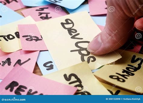 Devops Concept Man Hand Touching Devops Icon On Vr Screen On Desk Methodology Development