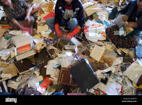 Women Sorting Manually Different Types Of Waste Paper Before The