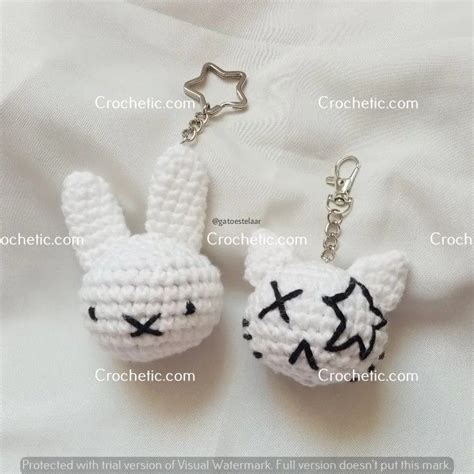 Two Crocheted Keychains That Have Been Made To Look Like Rabbits